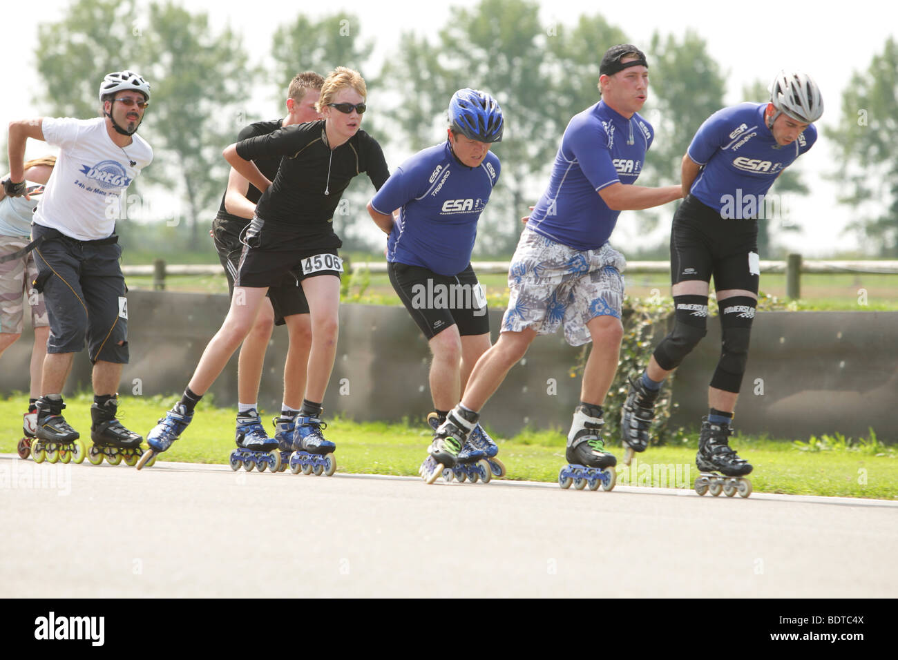 Speed skaters in line racing in a charity race Stock Photo - Alamy