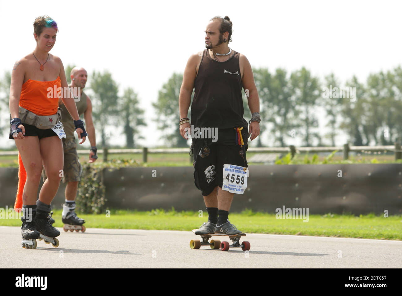 Skaters skating at a charity marathon Stock Photo - Alamy