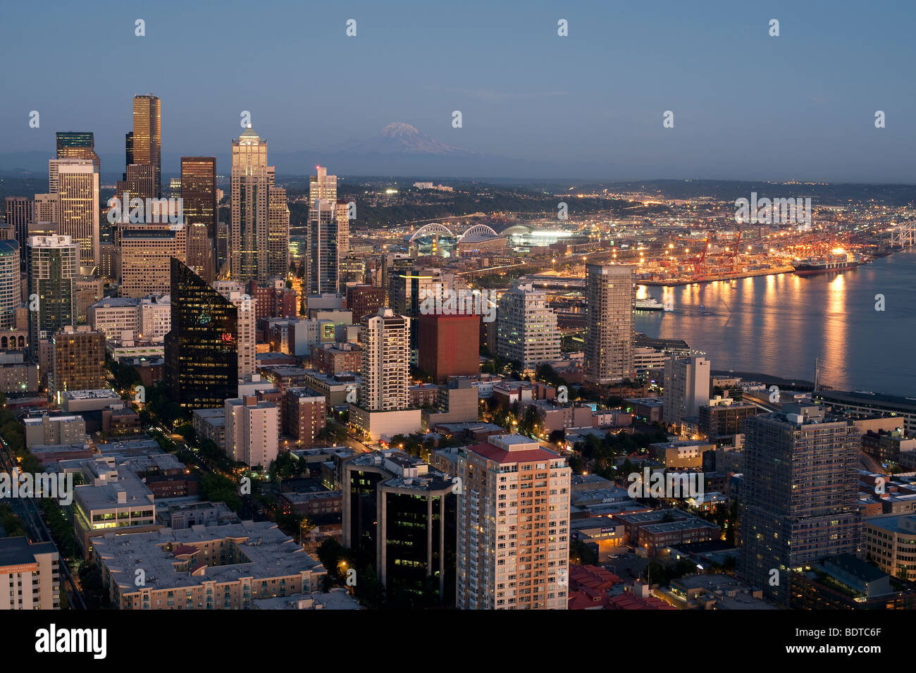 Retro image of Seattle Skyline with Mount Rainier and downtown building ...