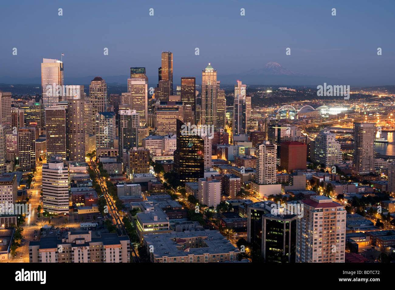 Retro image of Seattle Skyline with Mount Rainier and downtown building ...