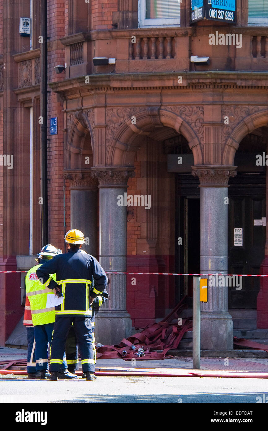 Firemen during the aftermath of the April 30th, 2007 Dale Street fire ...