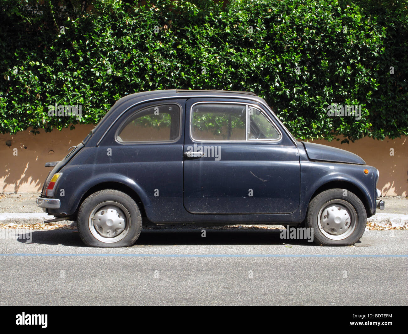 old fiat 500 car in street in rome italy Stock Photo - Alamy