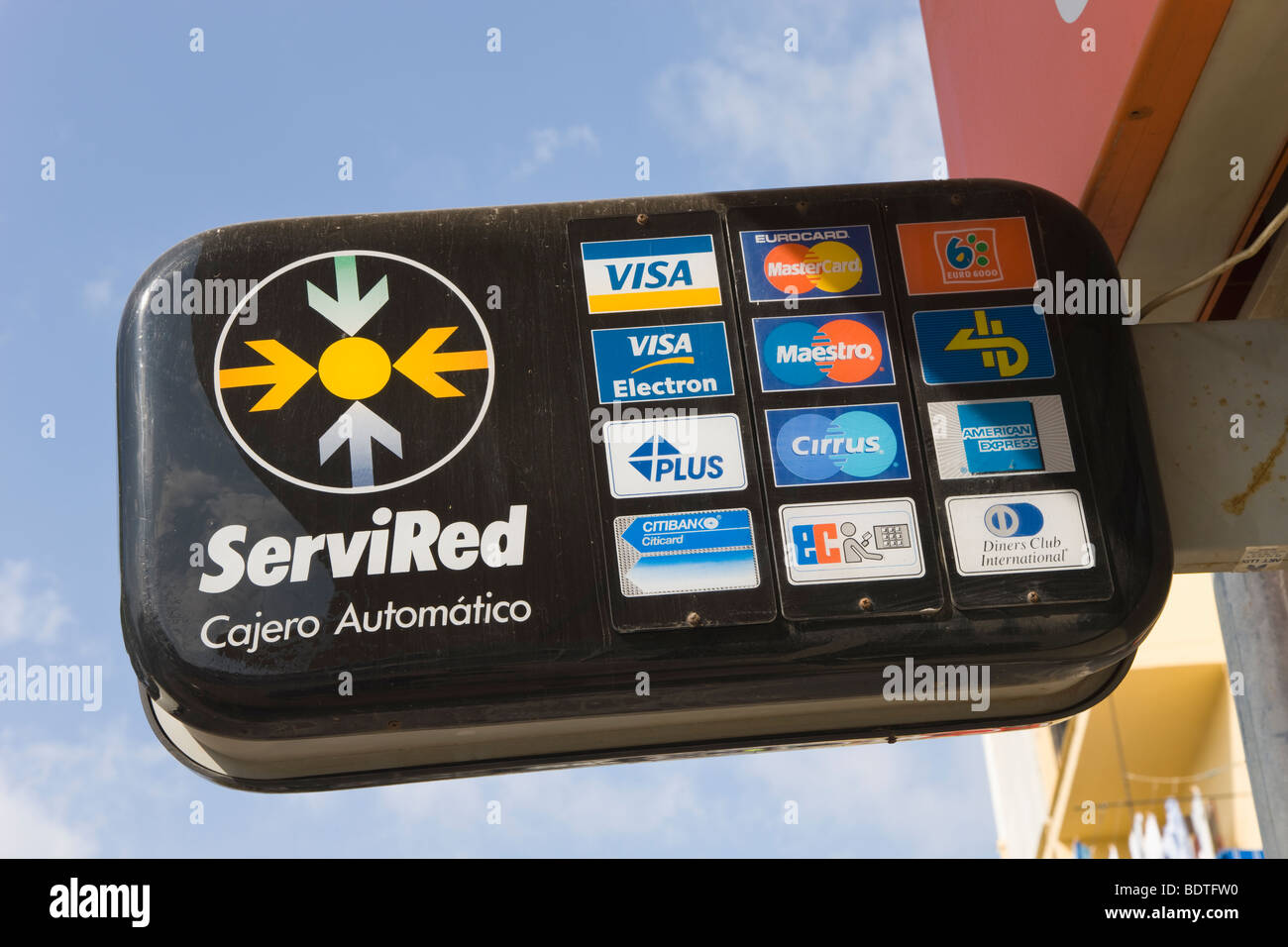 Sign outside Spanish bank showing which credit cards are accepted at ...