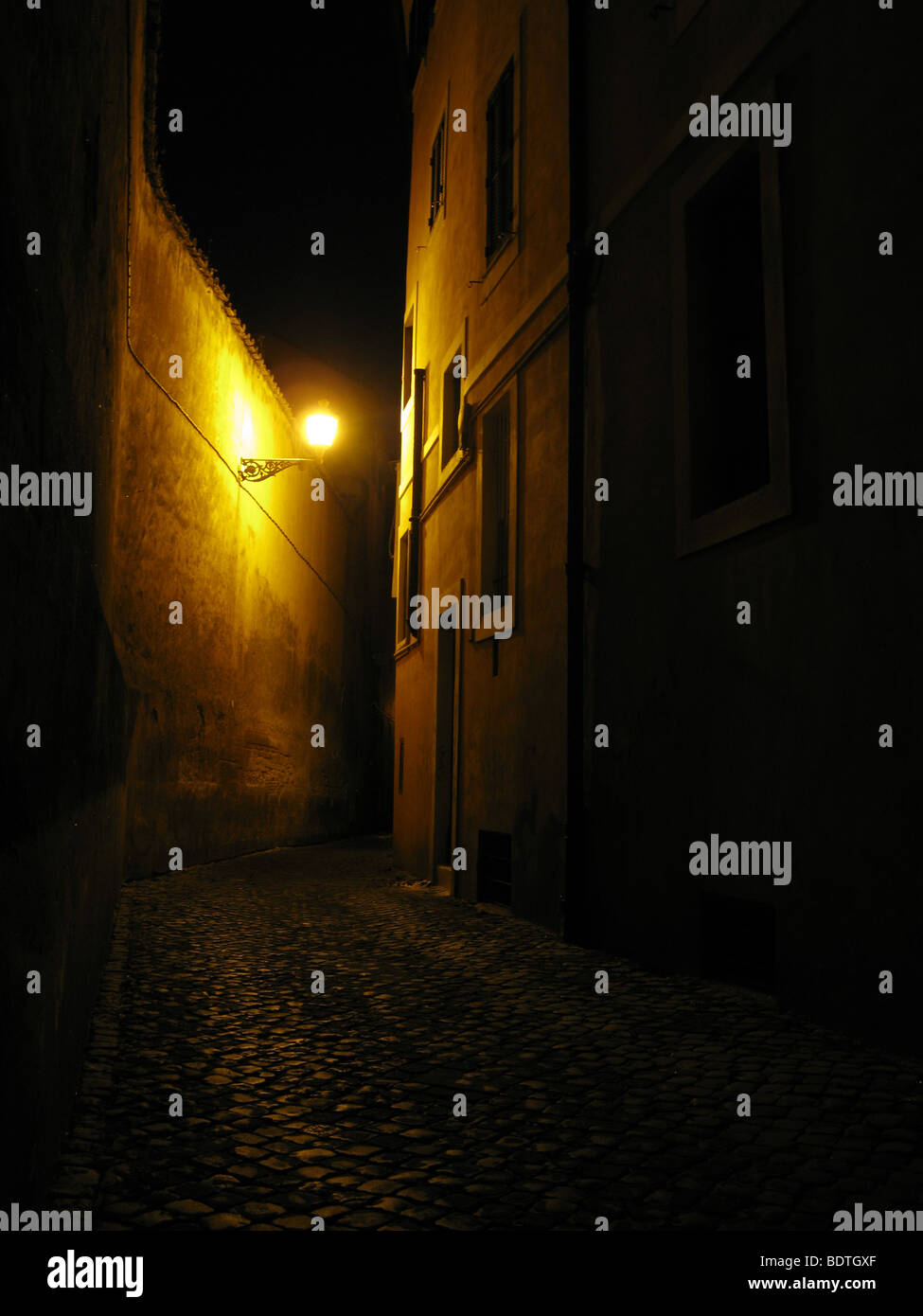 dark empty street at night in rome, italy Stock Photo - Alamy