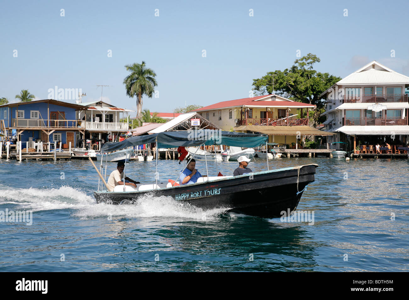 panama, bocas del toro, boat tour with tourists take off to the islands ...