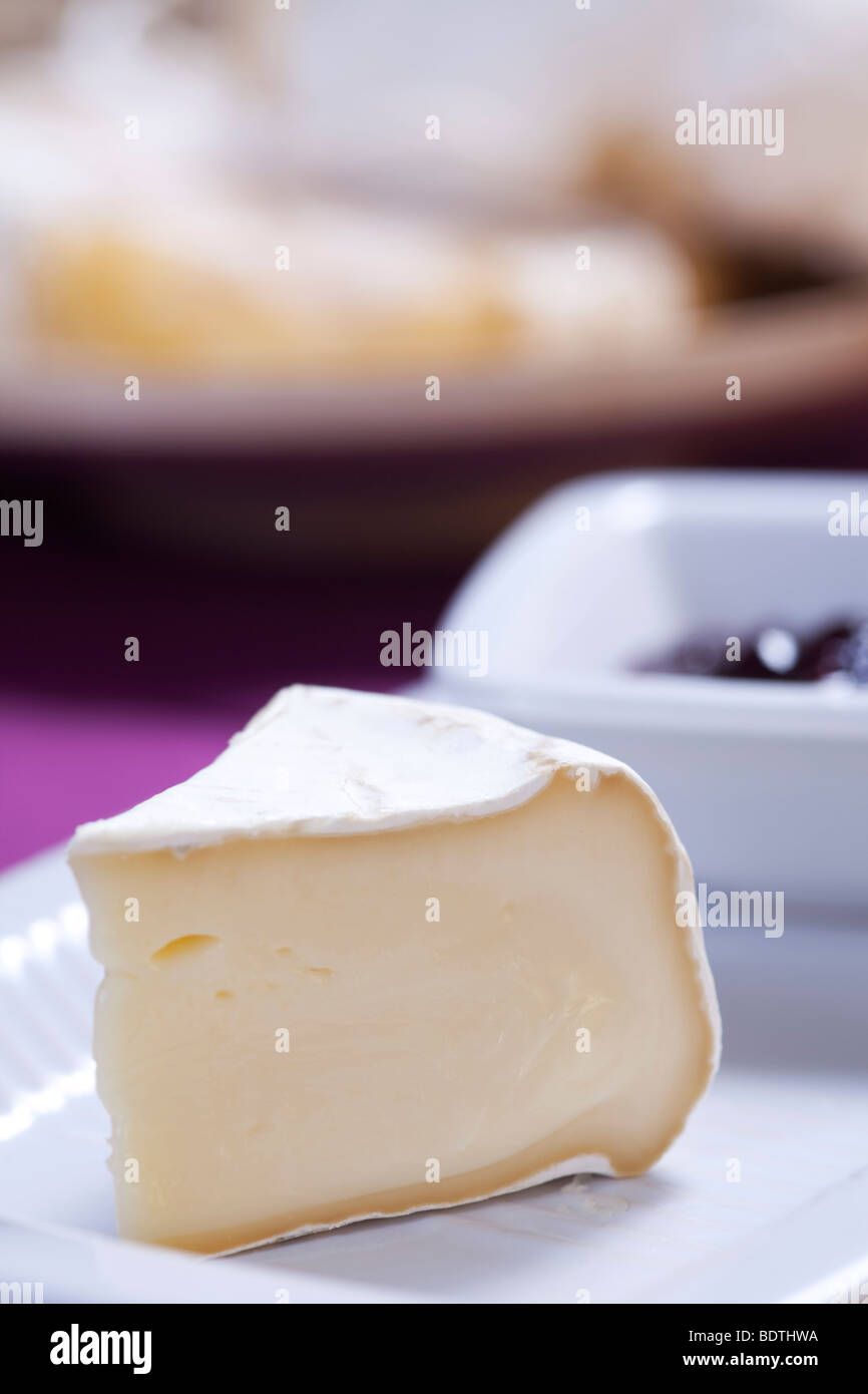 Slice of fresh cheese close up Stock Photo - Alamy