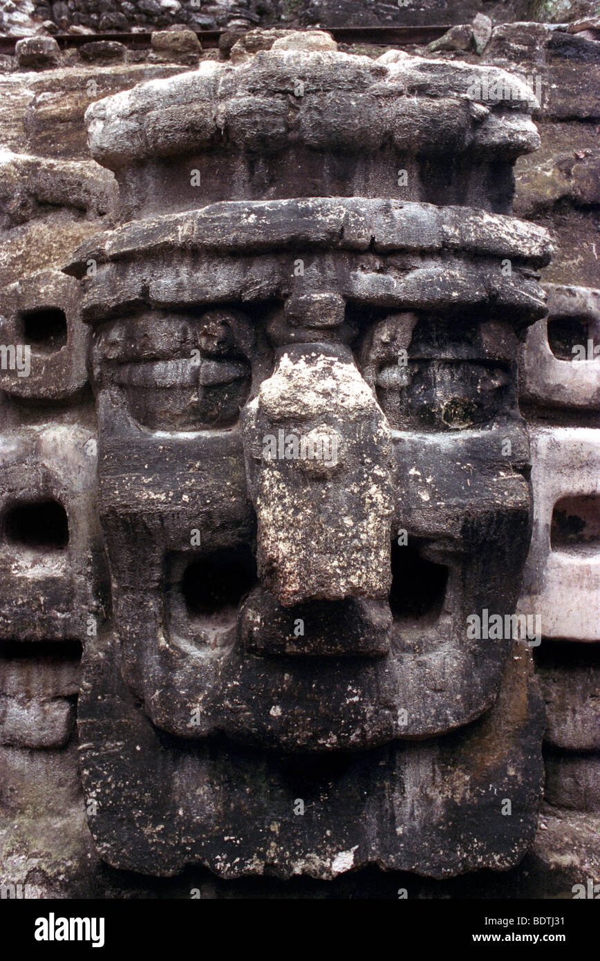 Tikal, large stone mask at the North Acropolis complex, representing ...