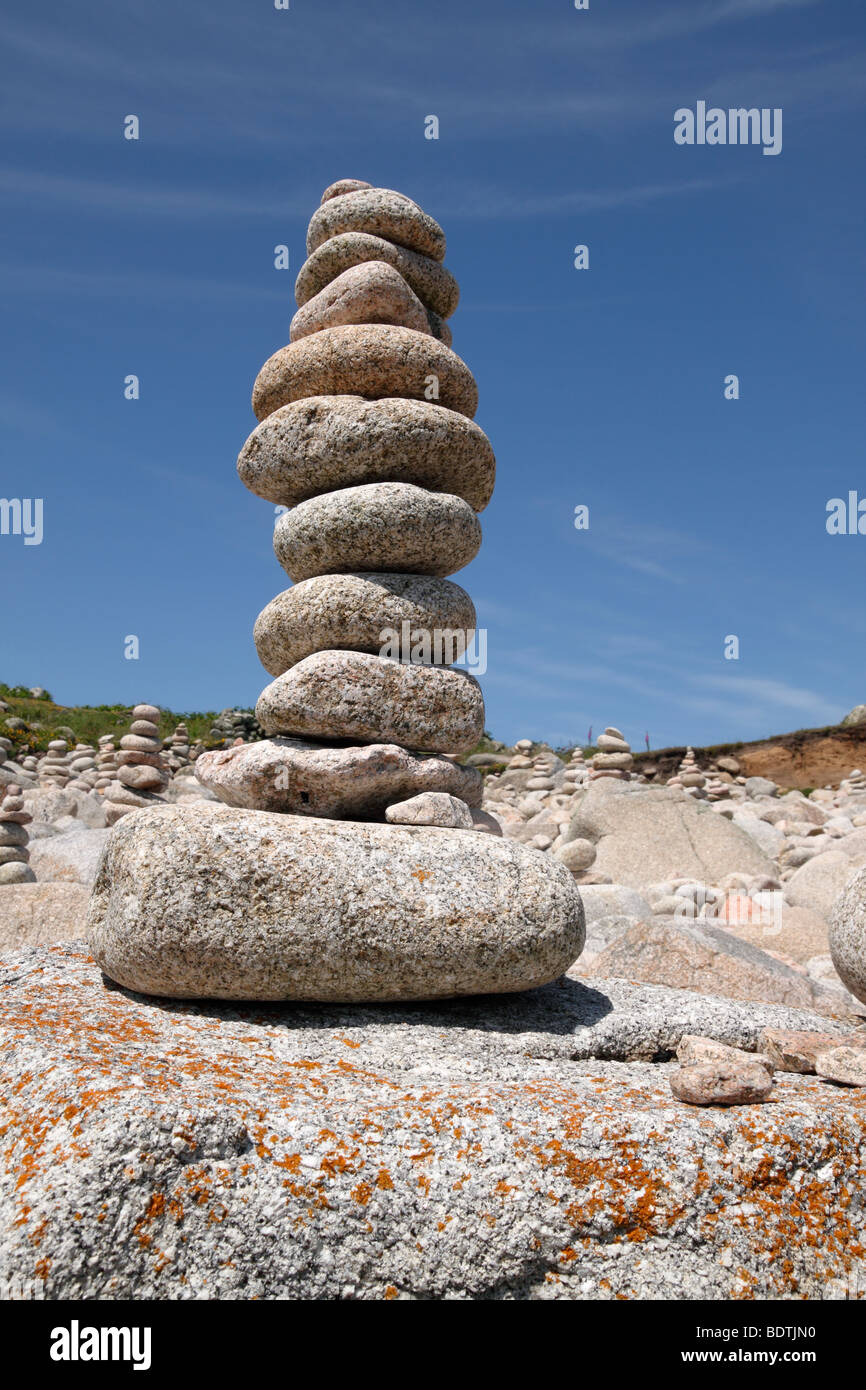 Rock granite large big high tall blue sky balanced outside hi-res stock ...