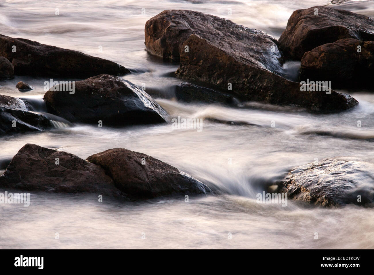 Fine Art Photograph of water flowing over rocks Stock Photo - Alamy