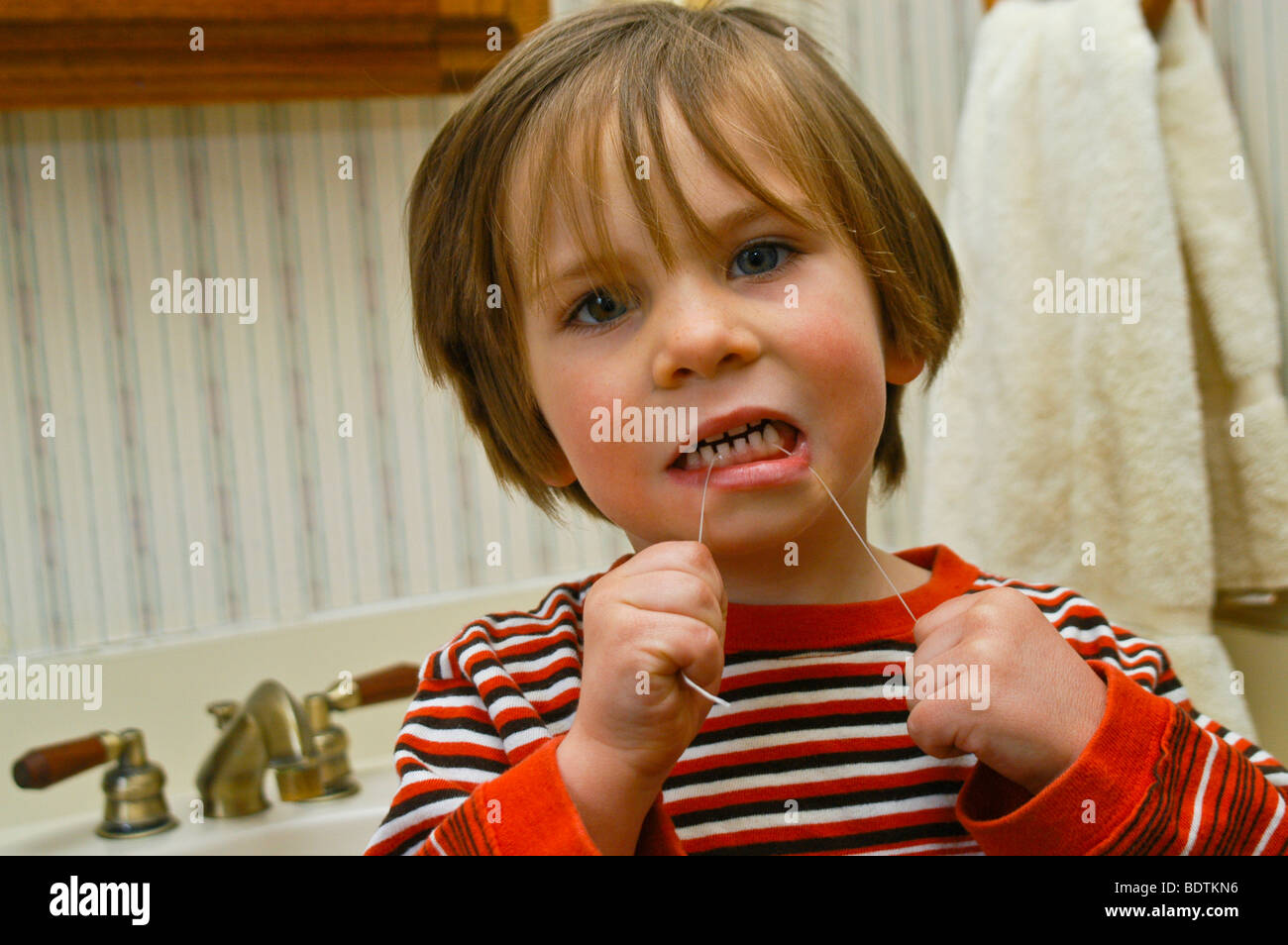 Child dental flossing hi-res stock photography and images - Alamy
