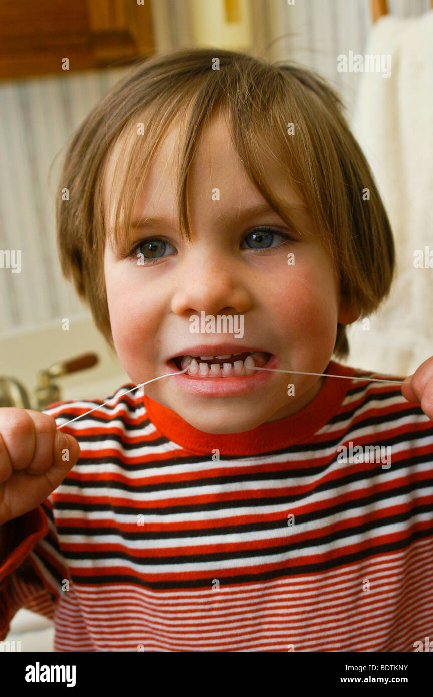 Child dental flossing hi-res stock photography and images - Alamy