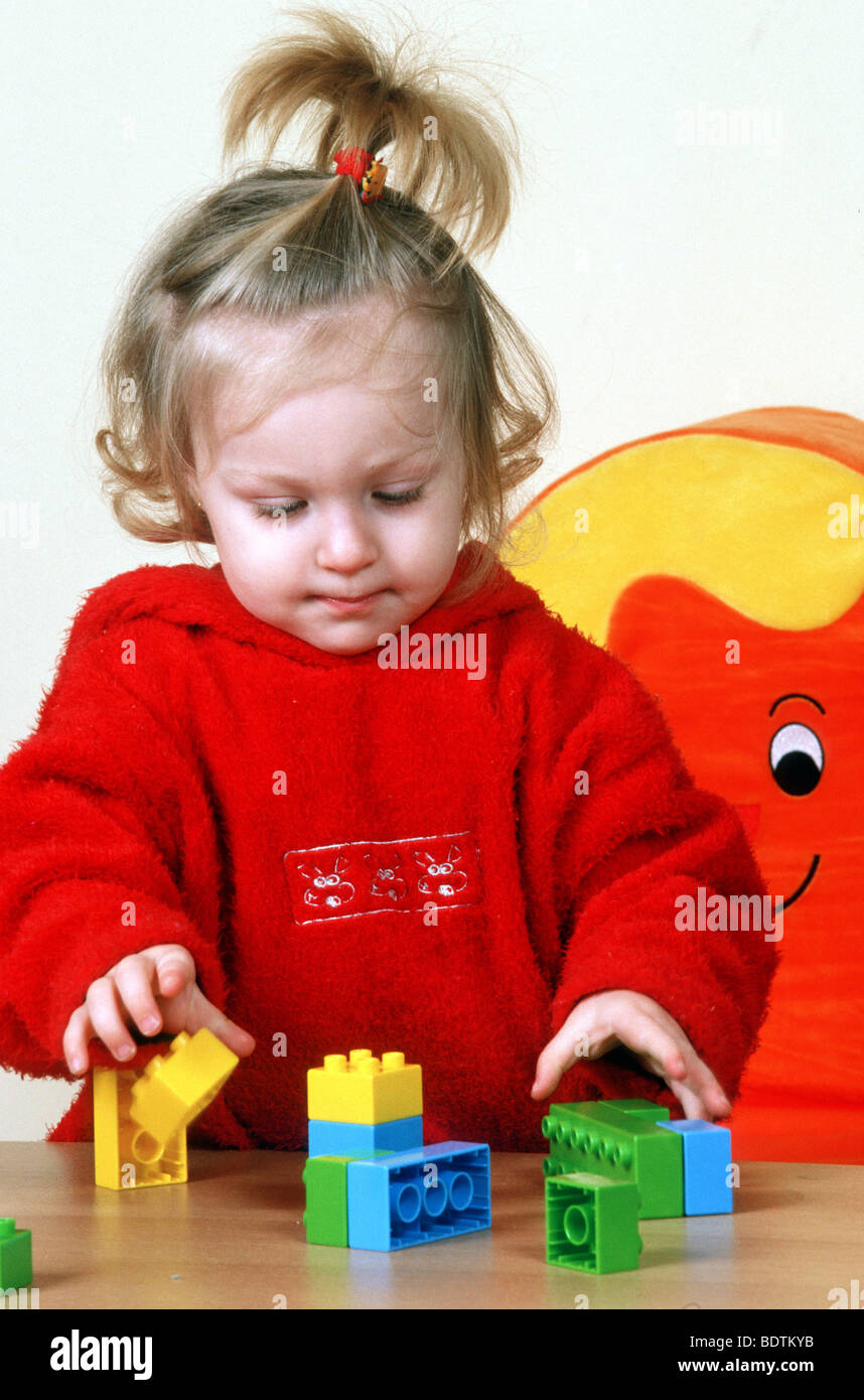 Little girl playing with lego hi-res stock photography and images - Alamy