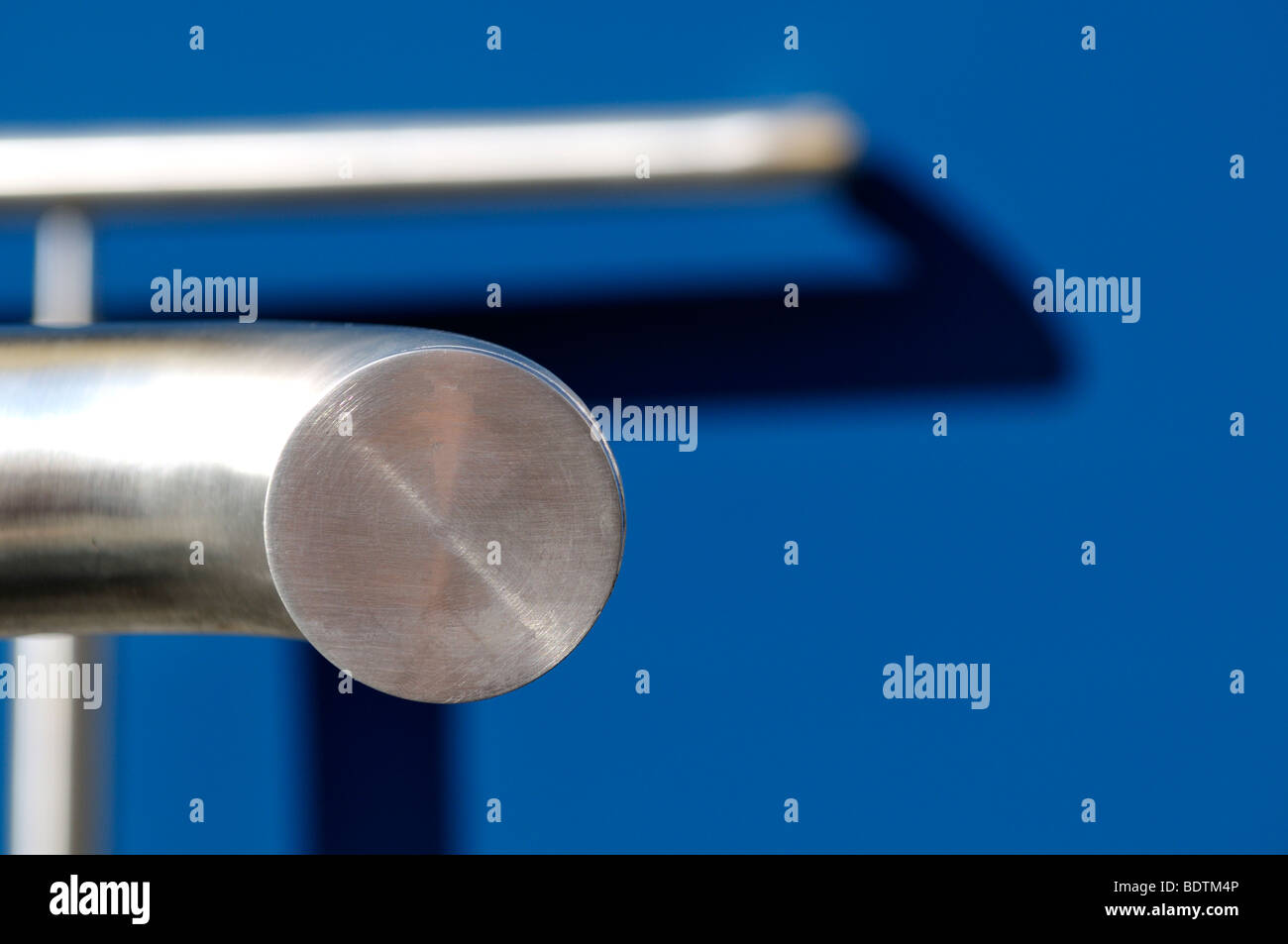 Abstract pattern of curved shadow from handrail on wall Stock Photo - Alamy