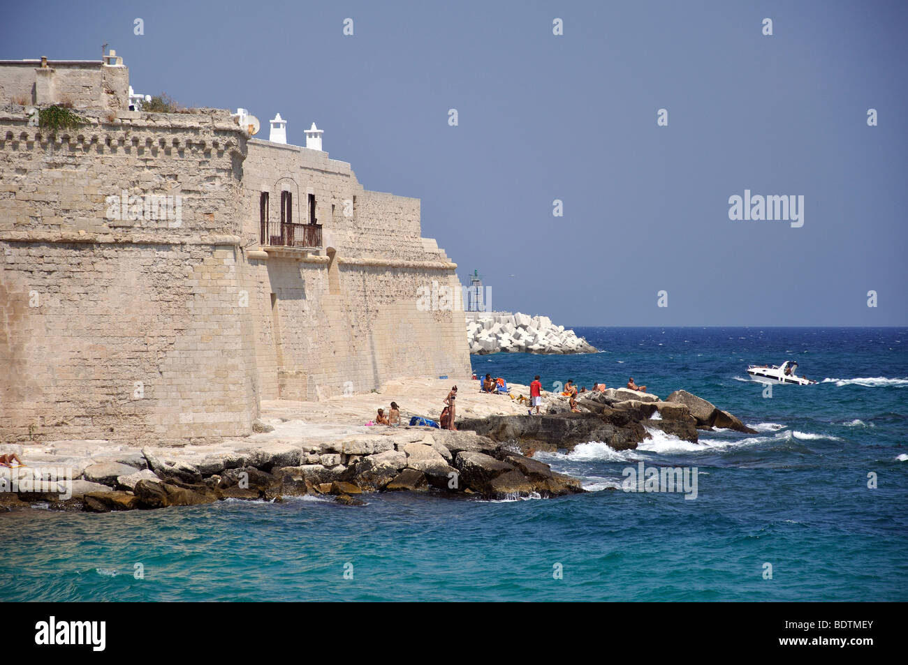 Old Town walls and beach, Old Town, Monopoli, Bari Province, Puglia ...