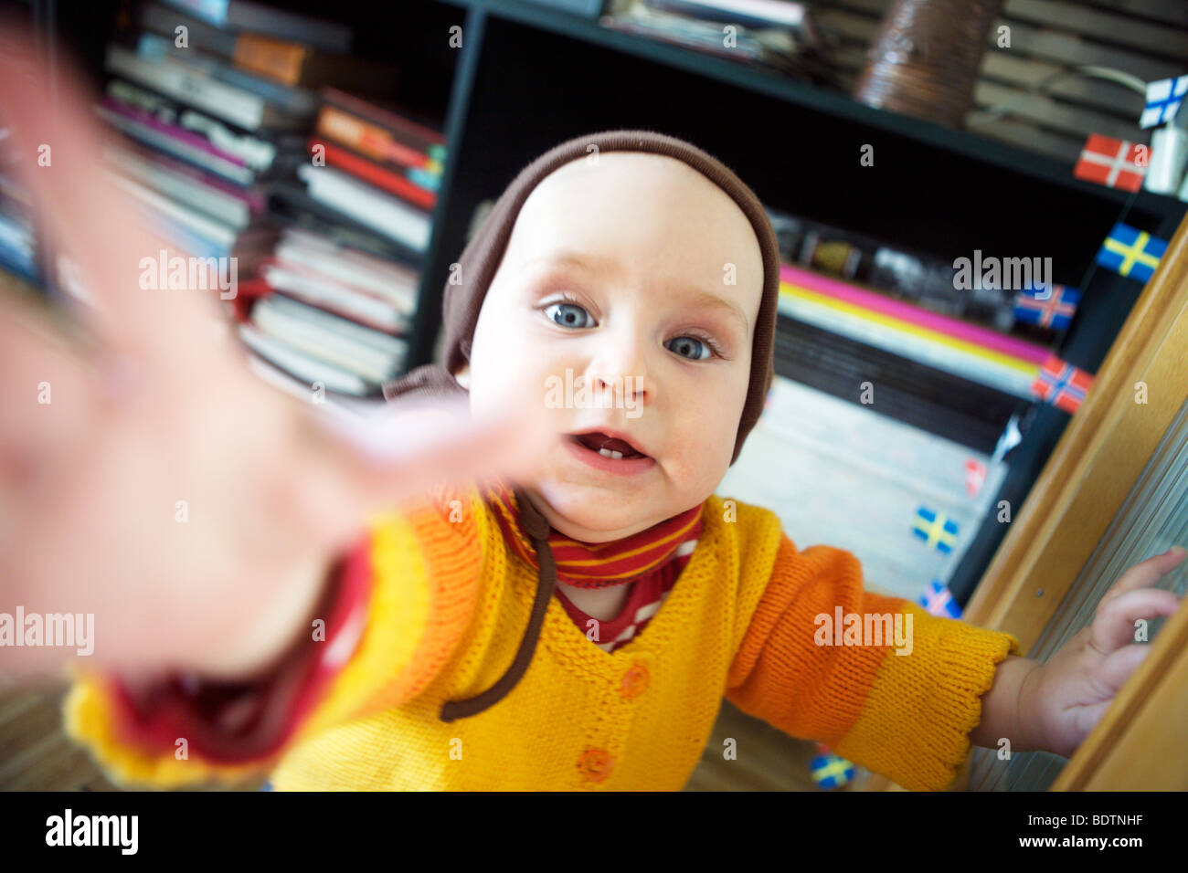A girl reaching for the camera Stock Photo - Alamy
