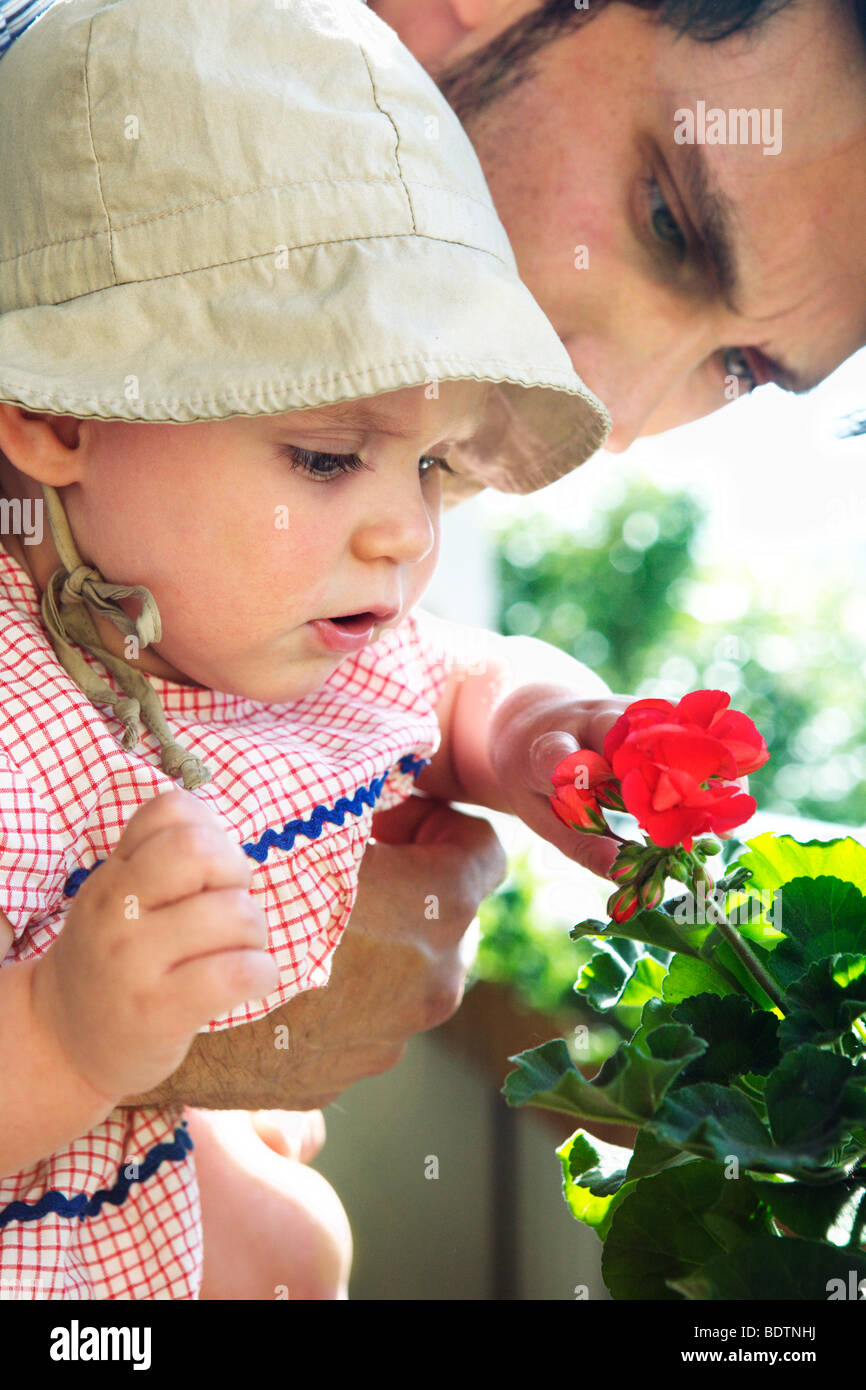 Parents daughter discovering plants hi-res stock photography and images ...
