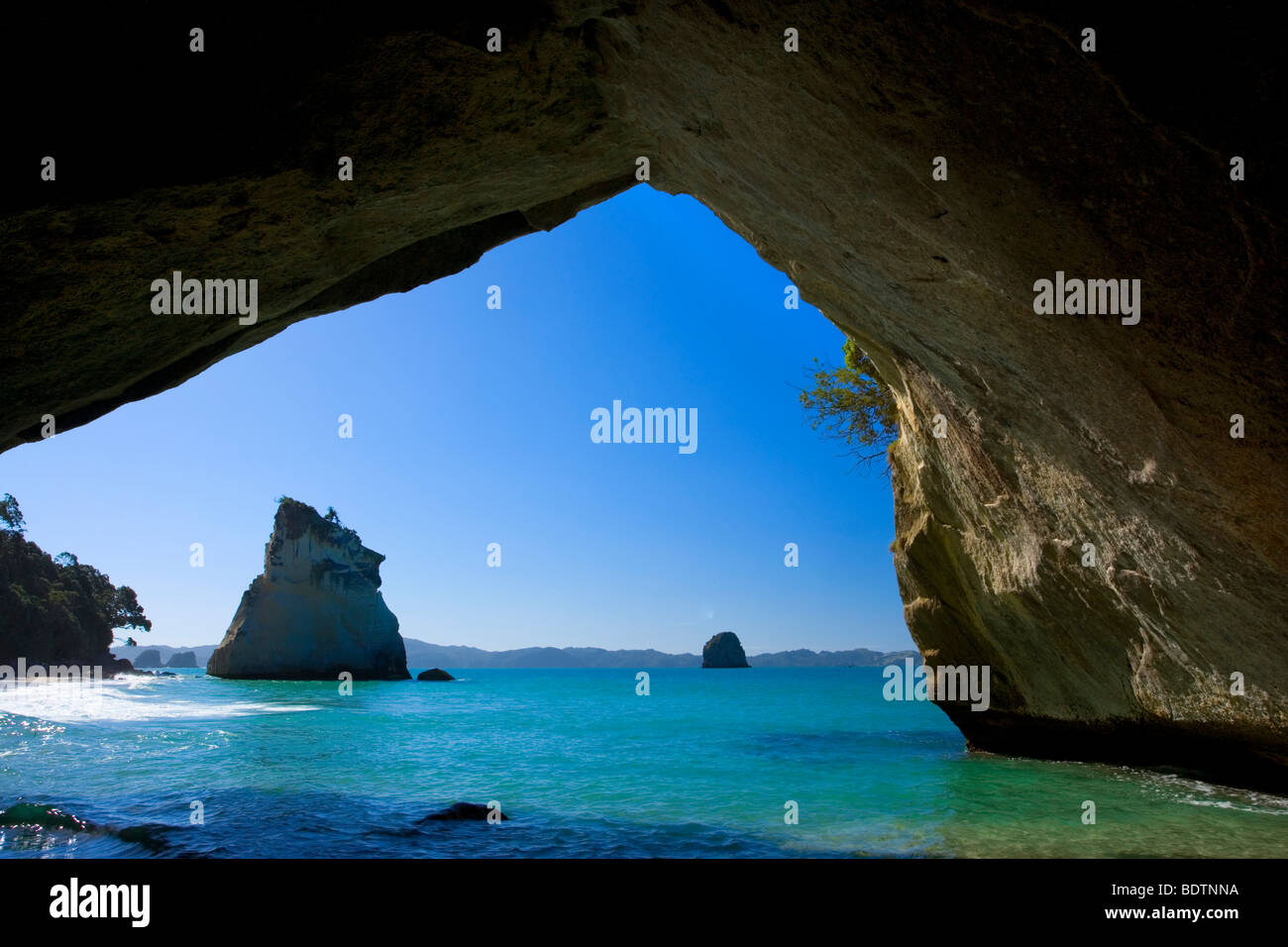 Cathedral Cove, by wind and water artfully sculpted rock formation at ...