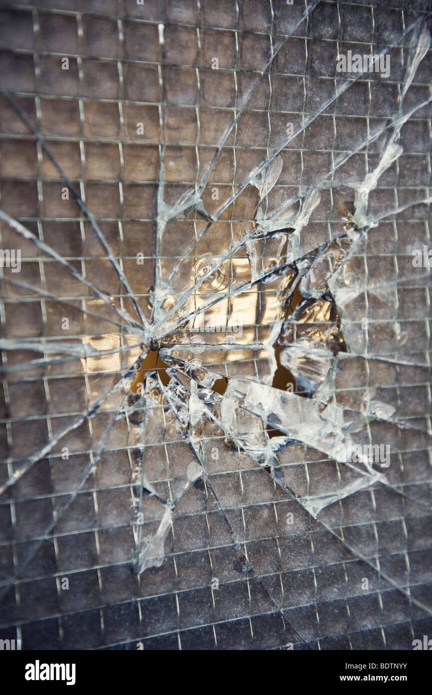 A smashed pane of glass Stock Photo - Alamy