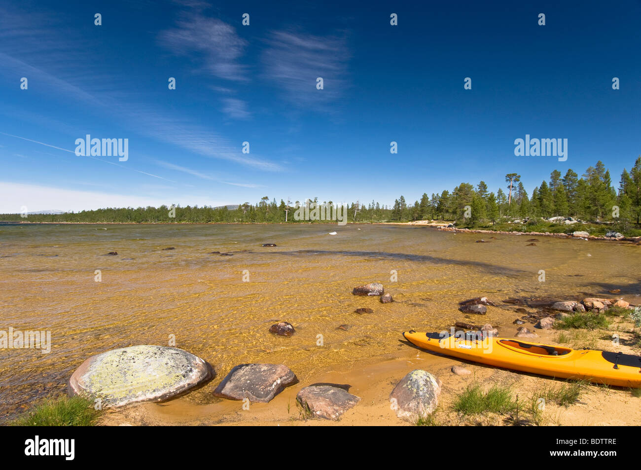 kayak at sandy beach of lake rogen, nature reserve, sweden Stock Photo ...