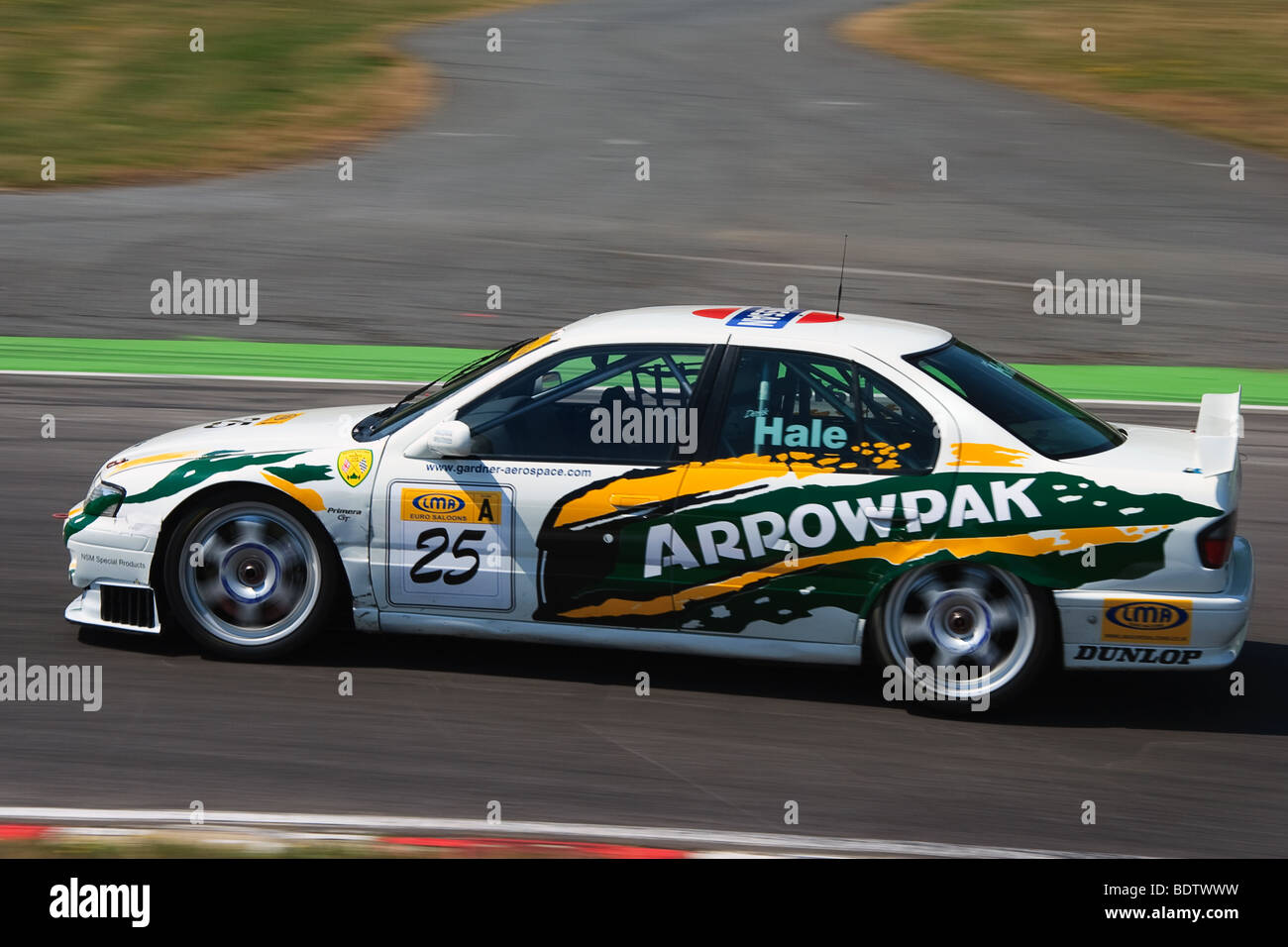 Derek Hale racing Nissan saloon car at Brand's Hatch Stock Photo - Alamy