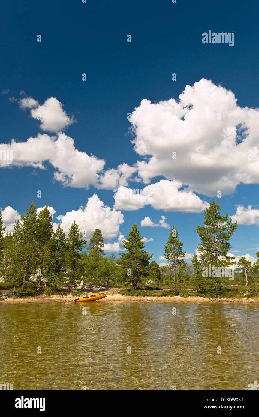 kayak at sandy beach of lake rogen, nature reserve, sweden Stock Photo ...