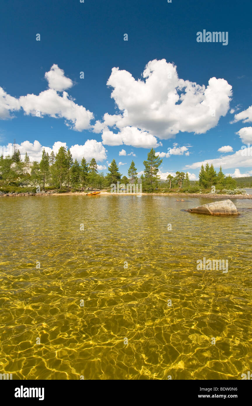 kayak at sandy beach of lake rogen, nature reserve, sweden Stock Photo ...