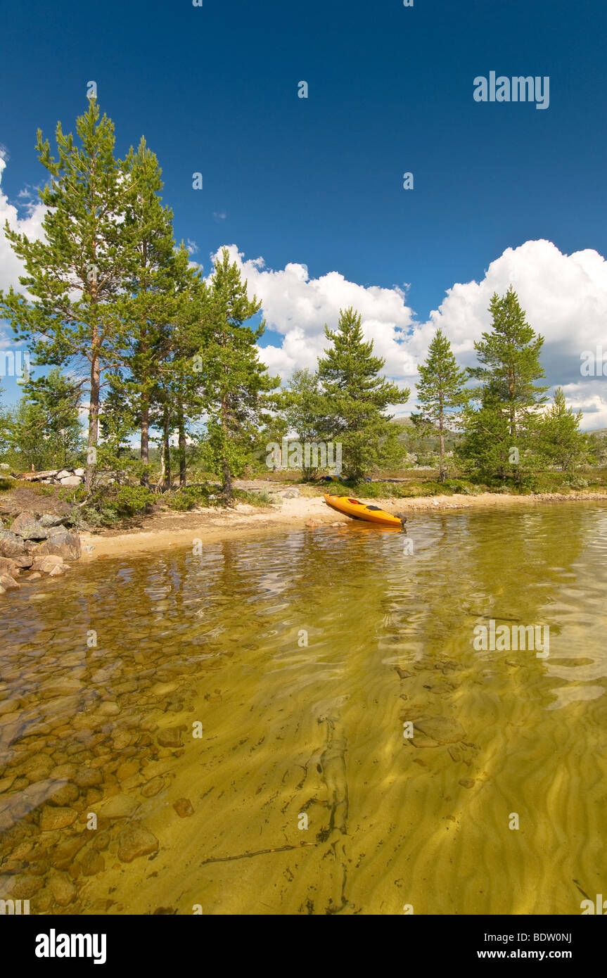 kayak at sandy beach of lake rogen, nature reserve, sweden Stock Photo ...