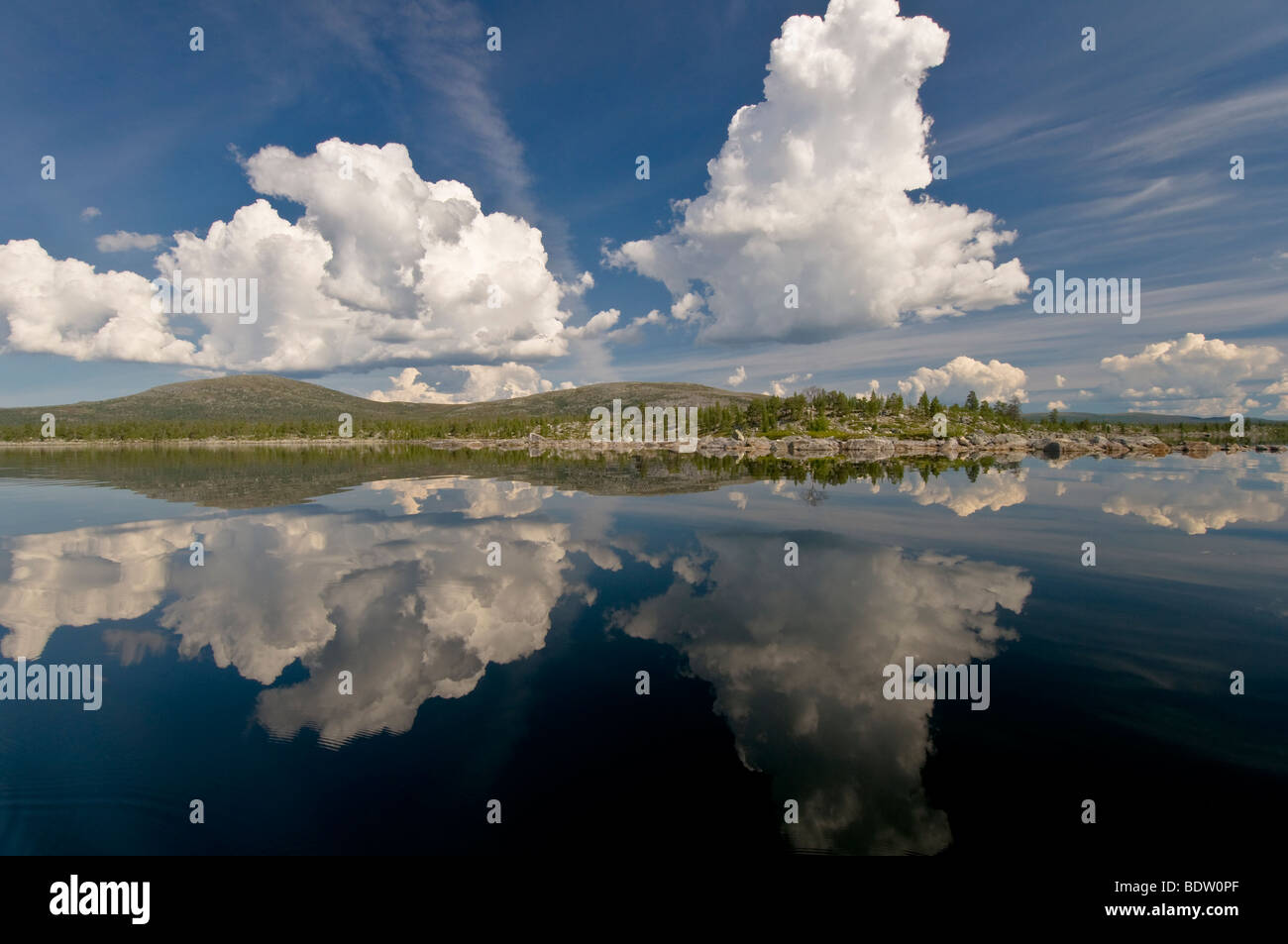 mirrowing clouds in lake rogen, nature reserve, sweden Stock Photo - Alamy