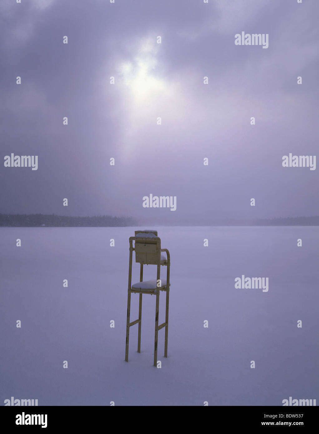 Lifeguard chair over frozen lake, winter Stock Photo - Alamy