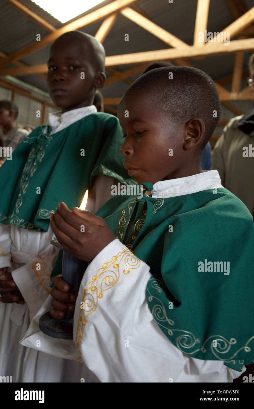 KENYA Faces of the congregation at Catholic mass in Mukuru Ruben, a ...