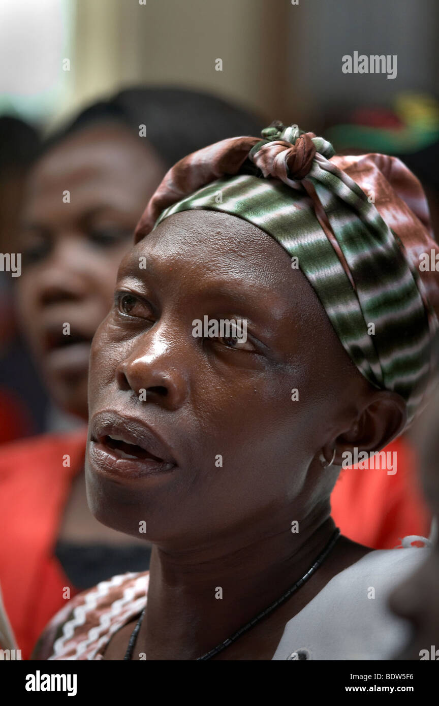 KENYA Faces of the congregation at Catholic mass in Mukuru Ruben, a ...