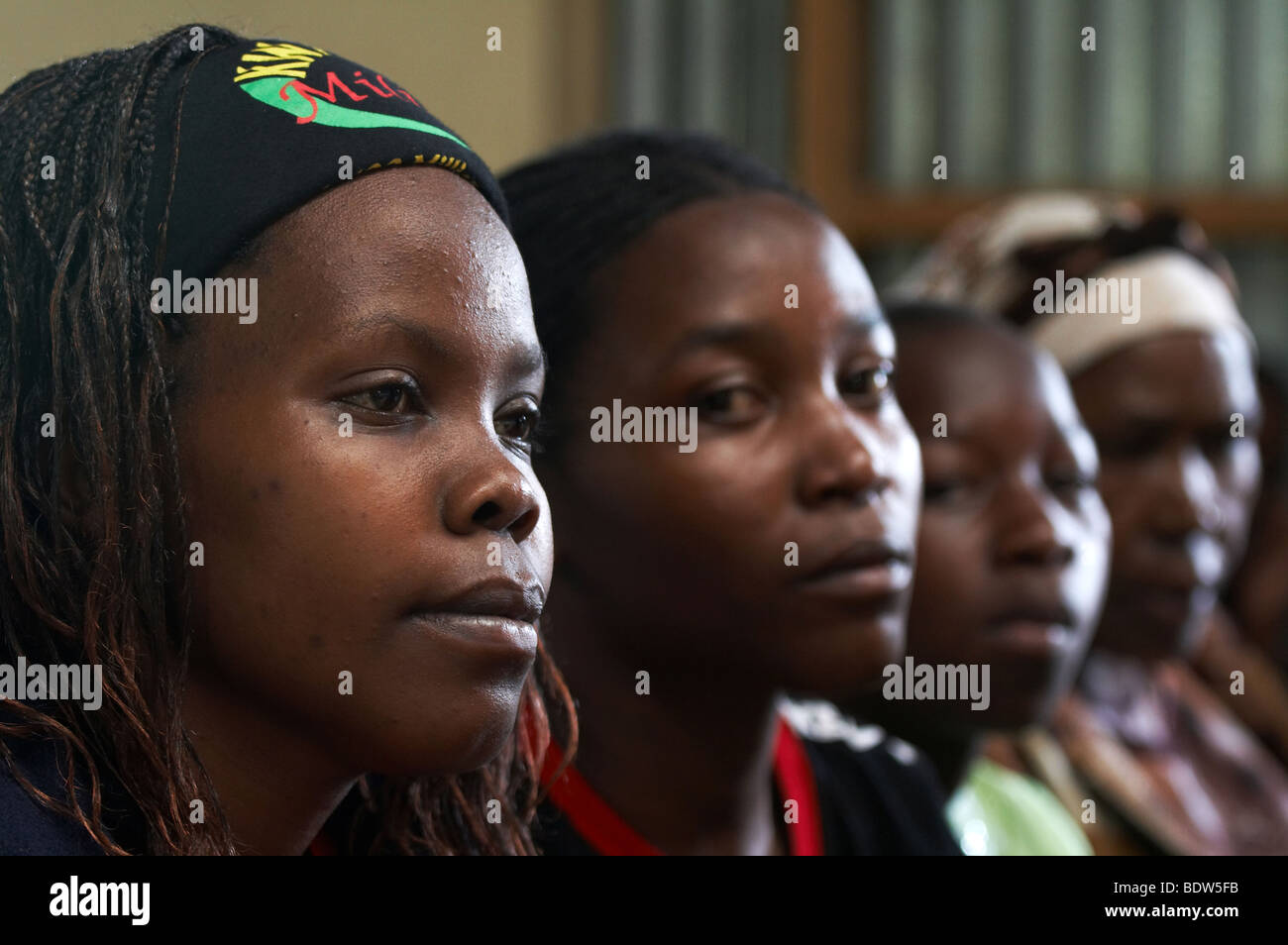 KENYA Faces of the congregation at Catholic mass in Mukuru Ruben, a ...