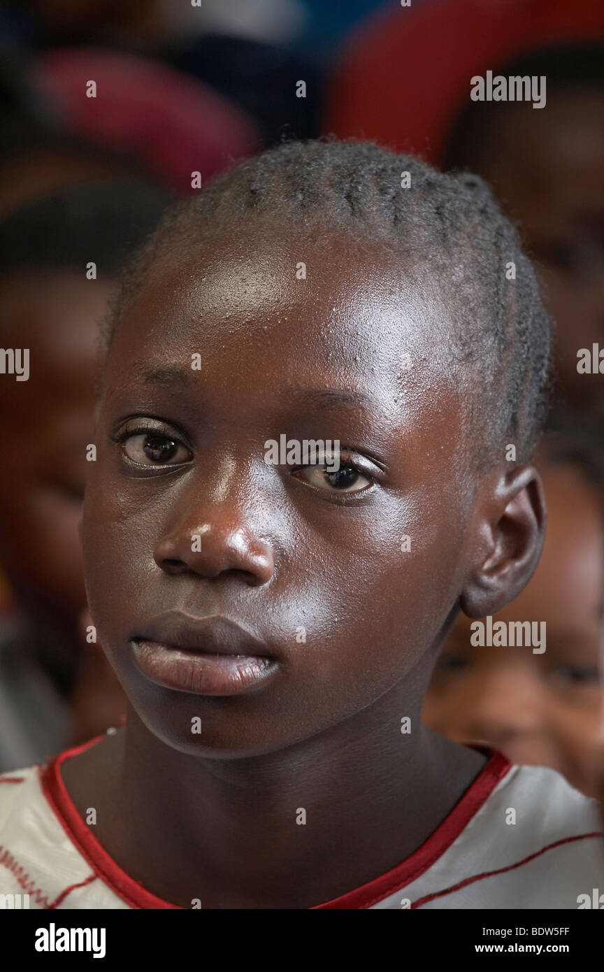 KENYA Faces of the congregation at Catholic mass in Mukuru Ruben, a ...