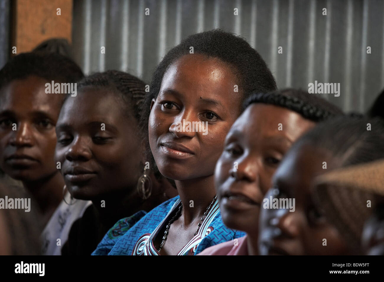 KENYA Faces of the congregation at Catholic mass in Mukuru Ruben, a ...
