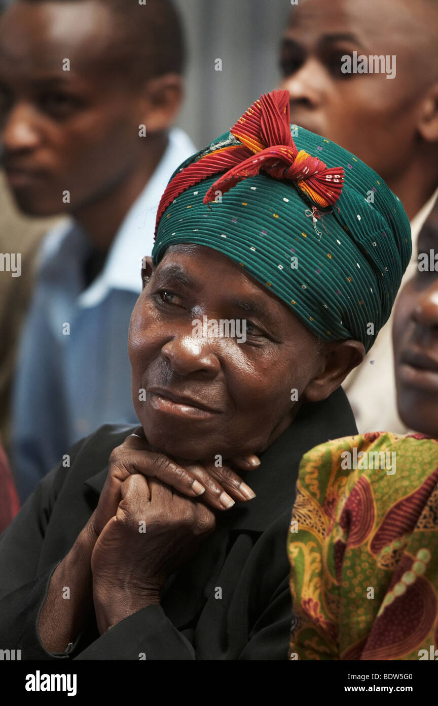 KENYA Faces of the congregation at Catholic mass in Mukuru Ruben, a ...
