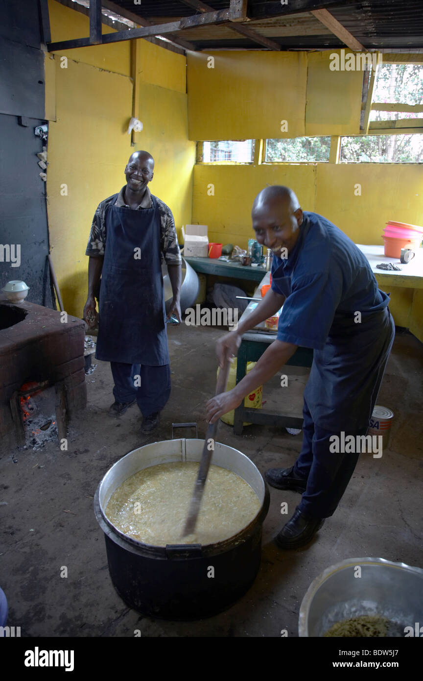 KENYA Cooks making soup in the kitchen of Christ the King Catholic ...