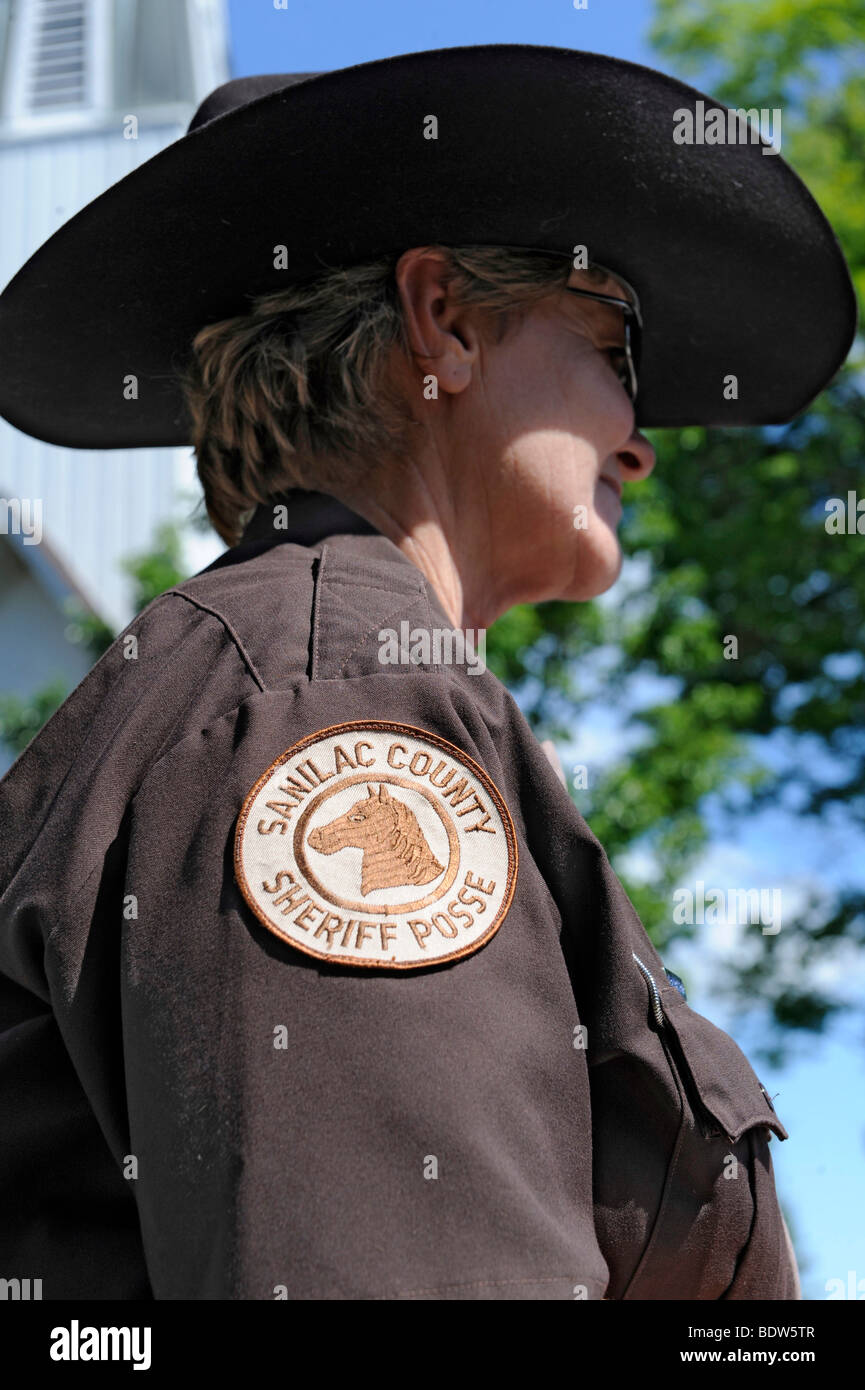 Female Uniformed County Sheriff with hat and patches Stock Photo - Alamy