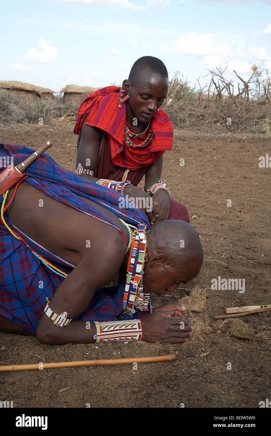 Rubbing two sticks together hi-res stock photography and images - Alamy