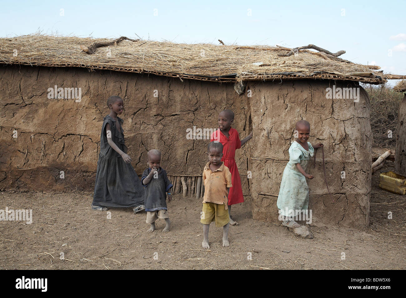 KENYA Masai children in front of their 'boma' or traditional house made ...