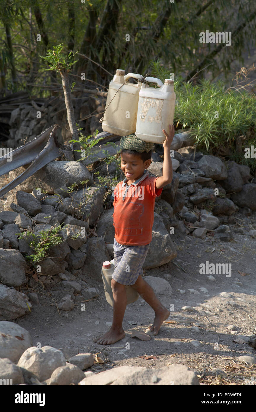 Boy Fetching Water High Resolution Stock Photography and Images - Alamy