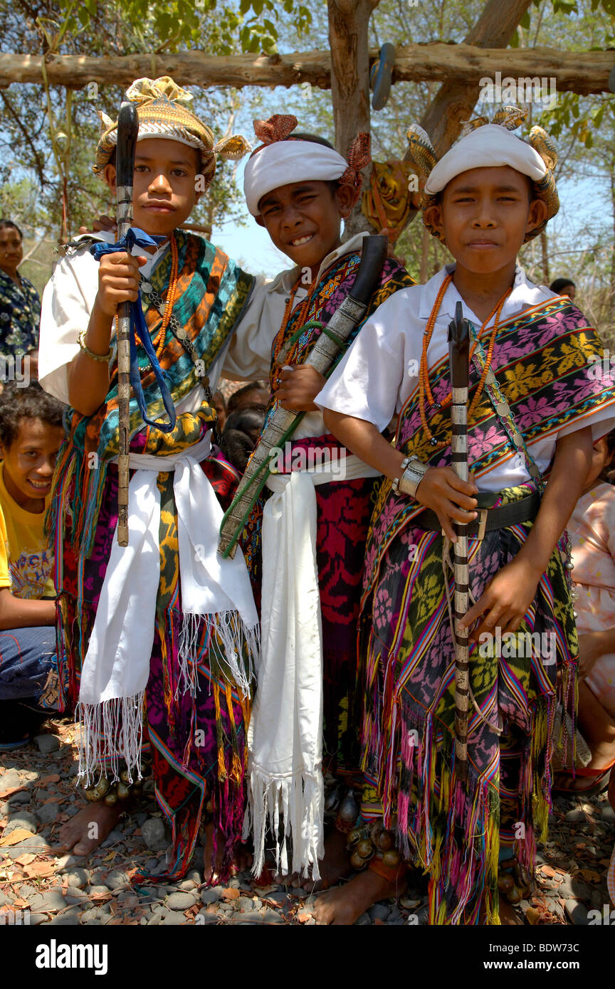 TIMOR LESTE Boys wearing traditional dress including ikat weaves and ...