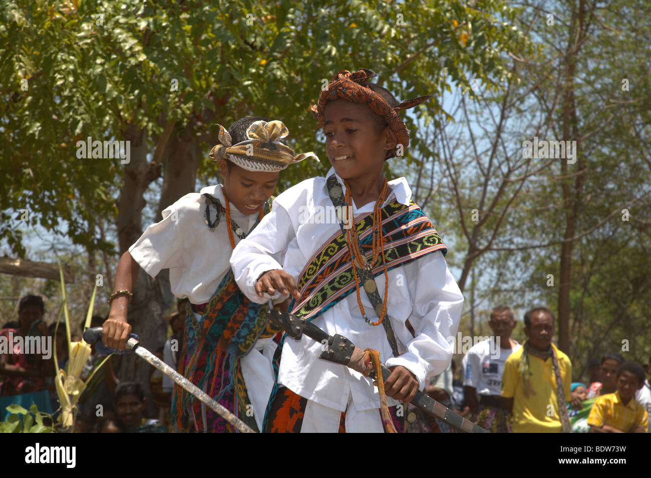 TIMOR LESTE Boys wearing traditional dress including ikat weaves and ...