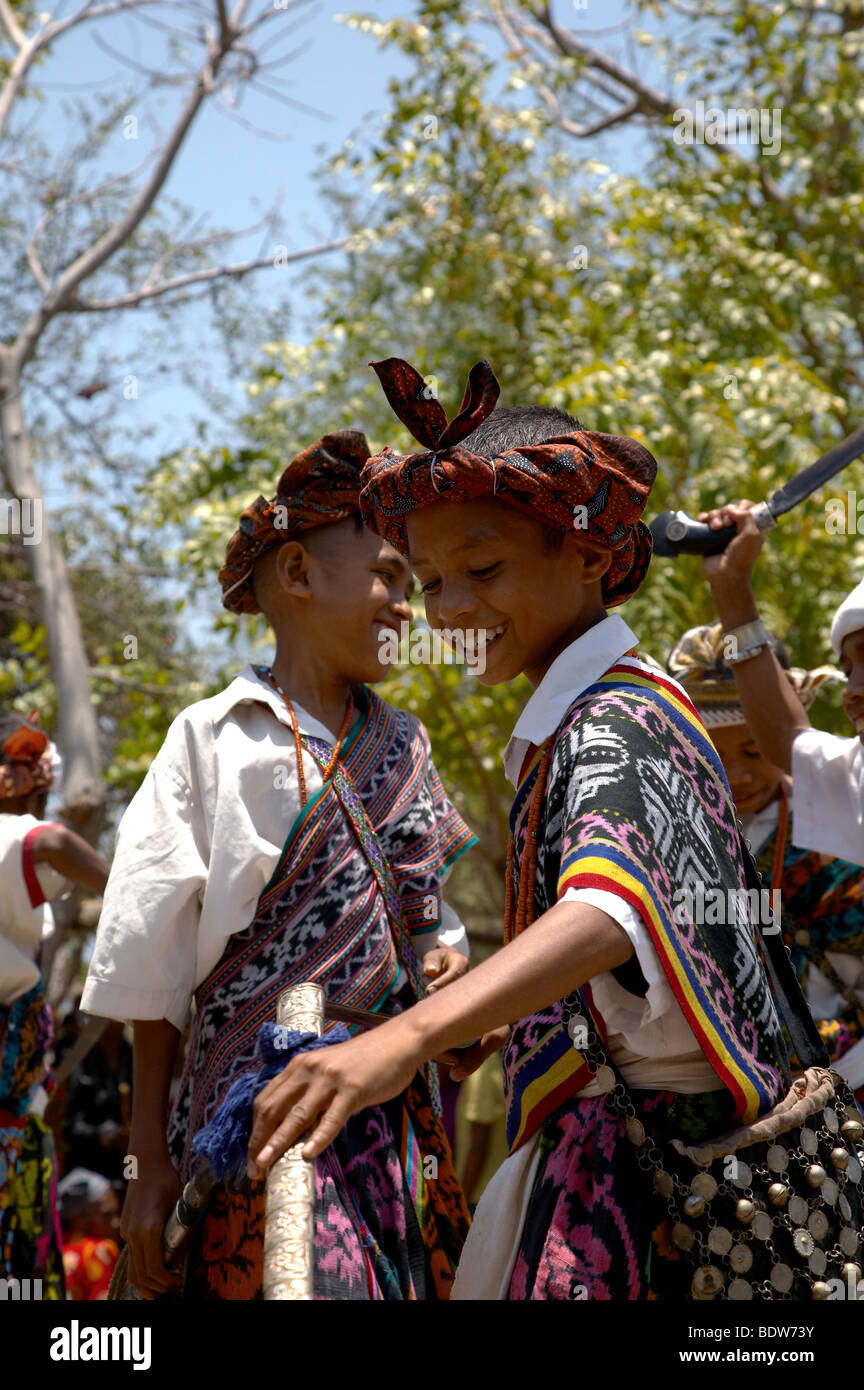 TIMOR LESTE Boys wearing traditional dress including ikat weaves and ...