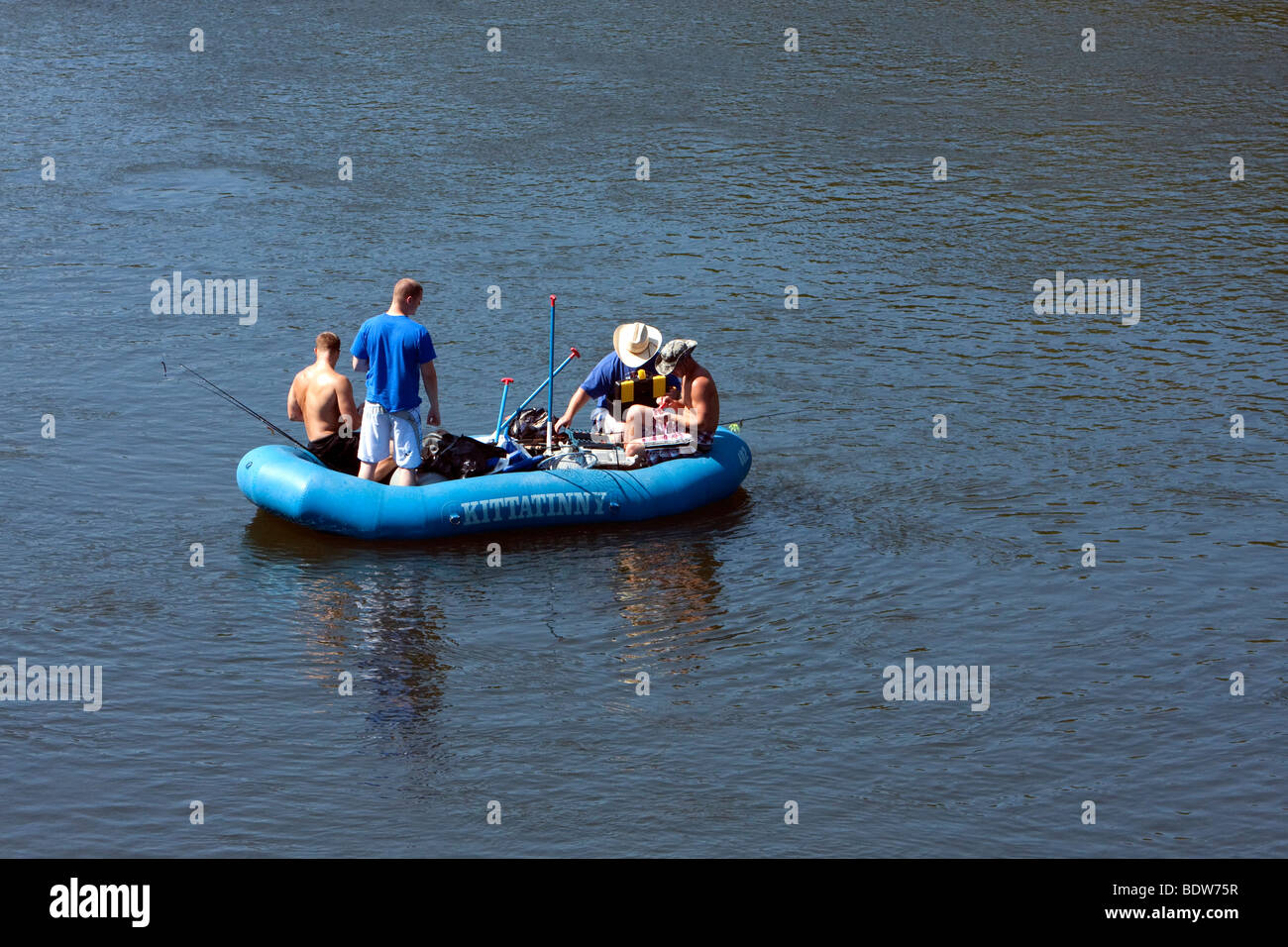 People on a float trip down the Delaware River. Raft, float, rubber ...