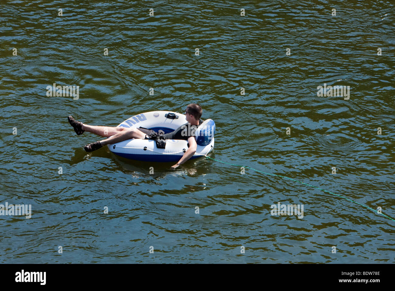 People on a float trip down the Delaware River. Raft, float, rubber ...
