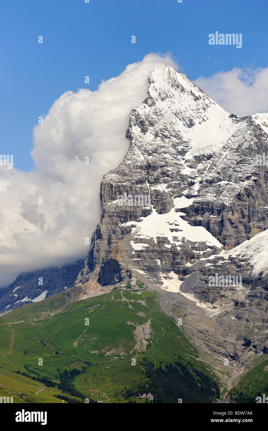 A cloud clings to the north wall of Mt. Eiger, Canton Bern, Switzerland ...