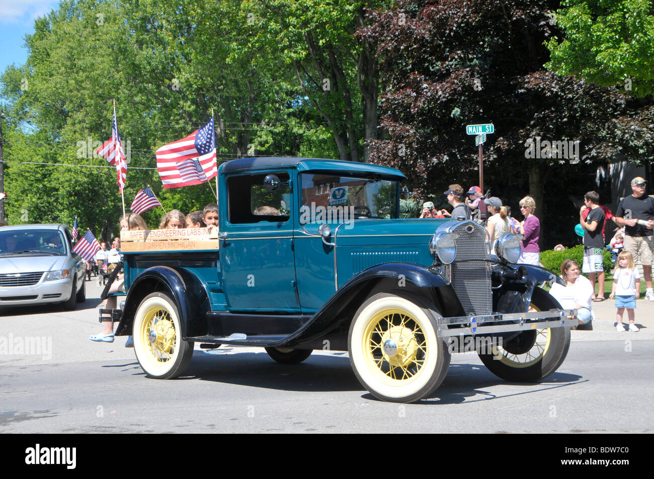 Antique cars in patriotic parade Stock Photo - Alamy