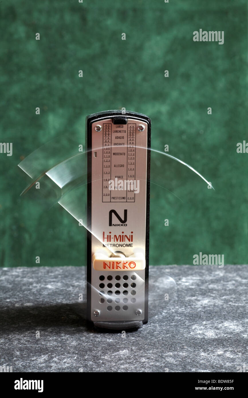 Nikko Hi-Mini Music Metronome - Metronome in motion Stock Photo - Alamy