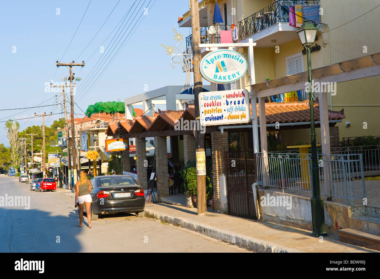 View down main street in village of Skala on the Greek Mediterranean ...