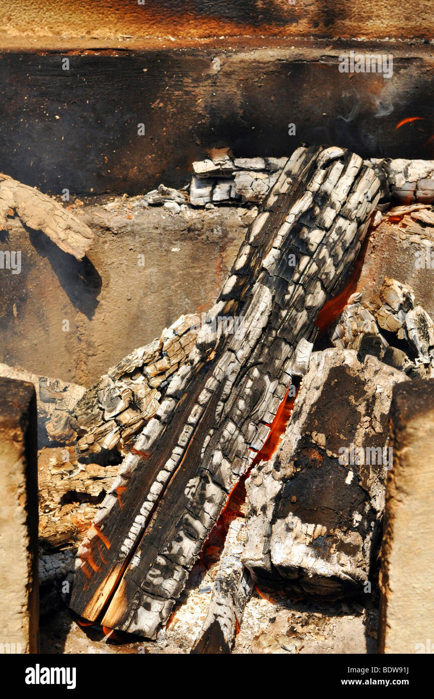 Burnt wood in a fire Stock Photo - Alamy